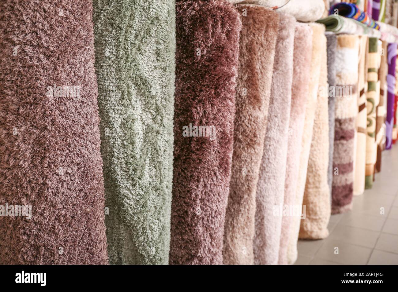 Many different carpets in shop Stock Photo - Alamy