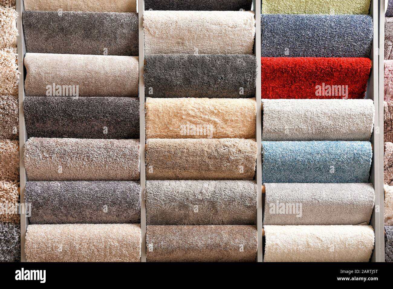 Different samples of carpets in shop Stock Photo - Alamy