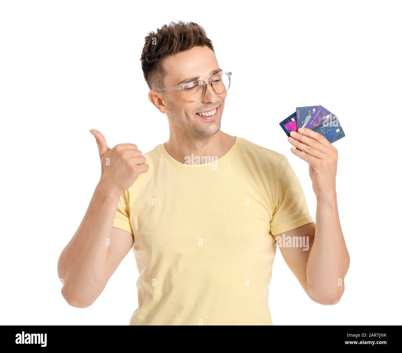 Young man showing cards hi-res stock photography and images - Alamy