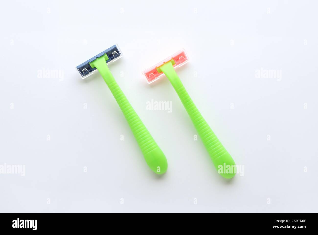 Razors for hair removal on white background Stock Photo - Alamy