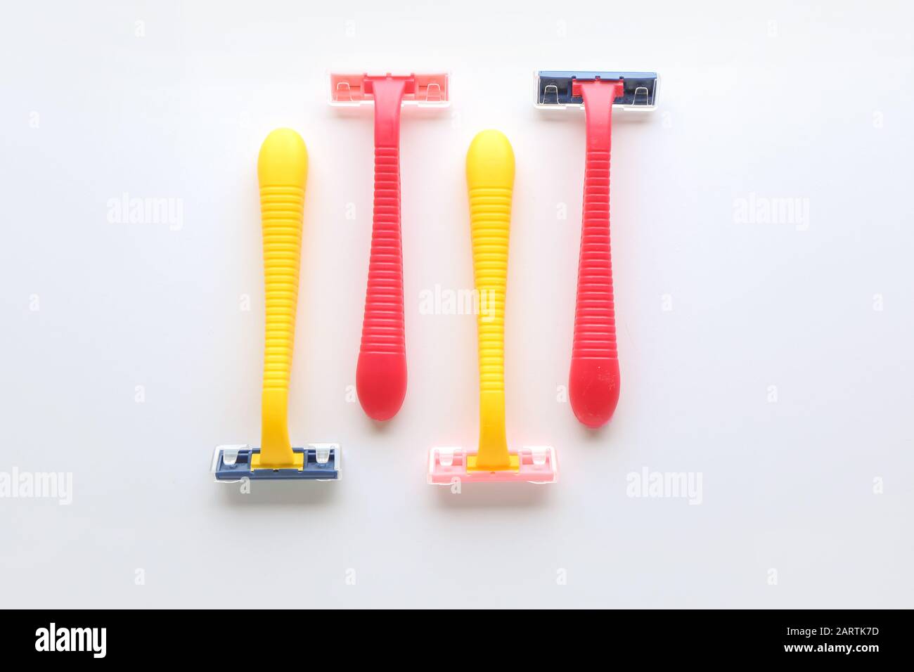 Razors for hair removal on white background Stock Photo - Alamy