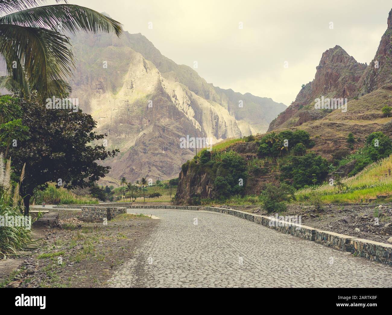 Rural landscape with road surrounded by arid mountains in the Coculi ...