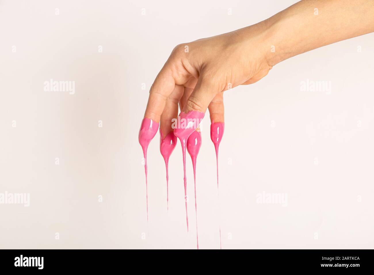 Female hand in sugaring paste on light background Stock Photo - Alamy
