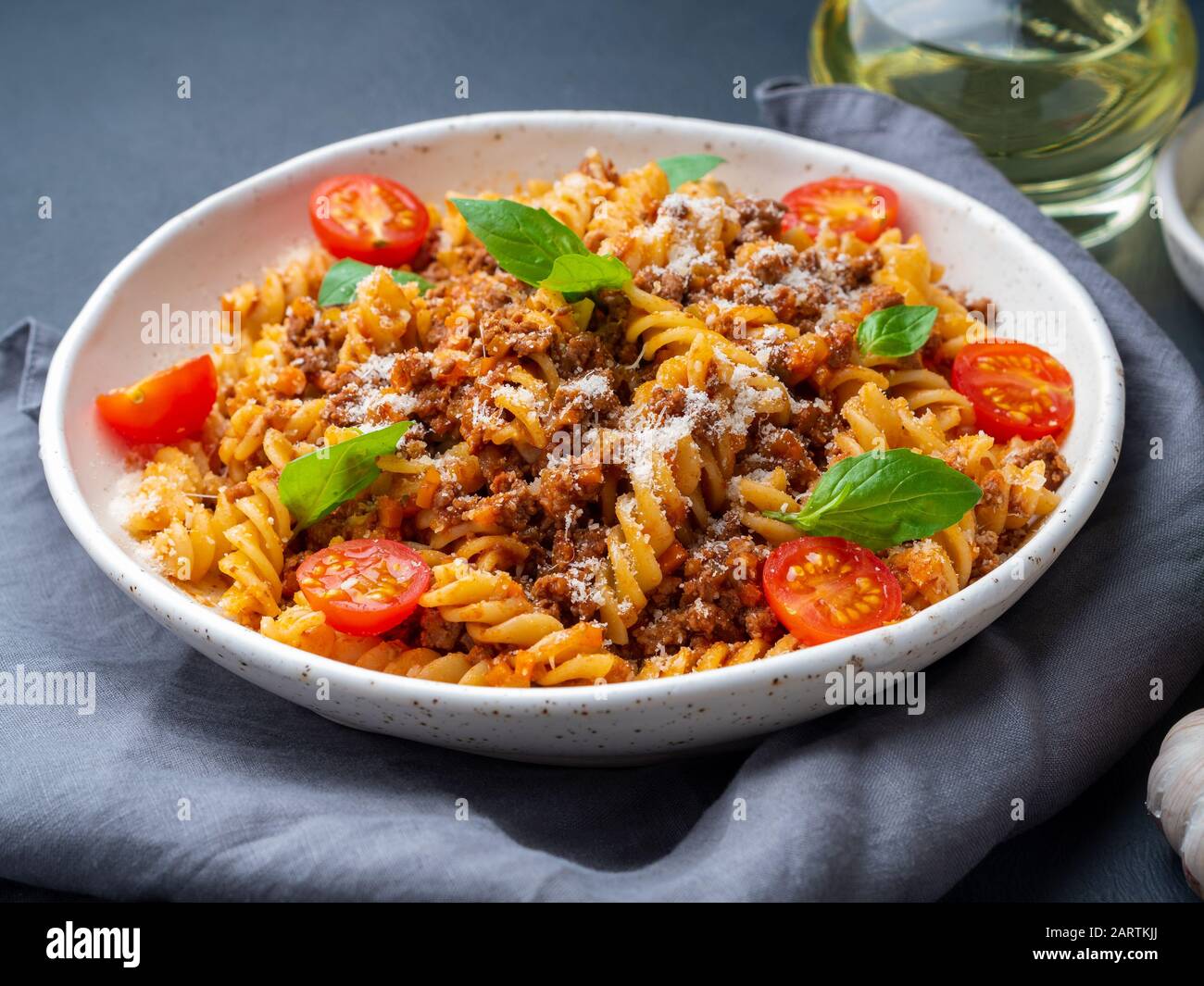 Bolognese pasta. Fusilli with tomato sauce, ground minced beef, basil ...