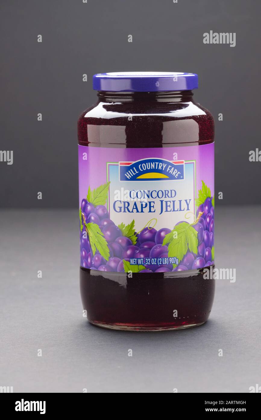Jar of grape jelly on dark background Stock Photo - Alamy