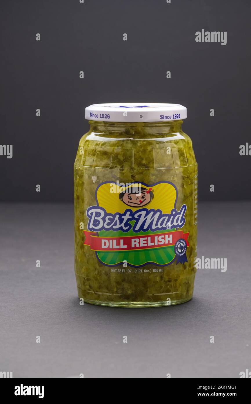 Glass jar of dill relish condiment on dark background Stock Photo - Alamy