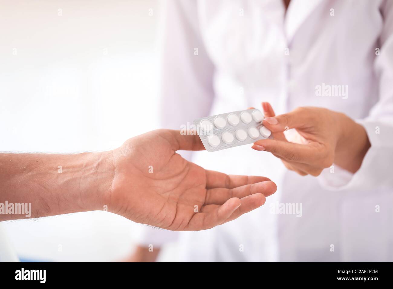 Doctor giving patient medicine, closeup Stock Photo - Alamy