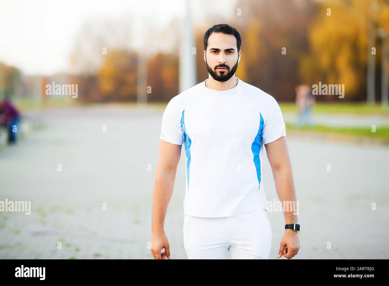 Fit muscular man running outside. Fitness and sport concept Stock Photo ...