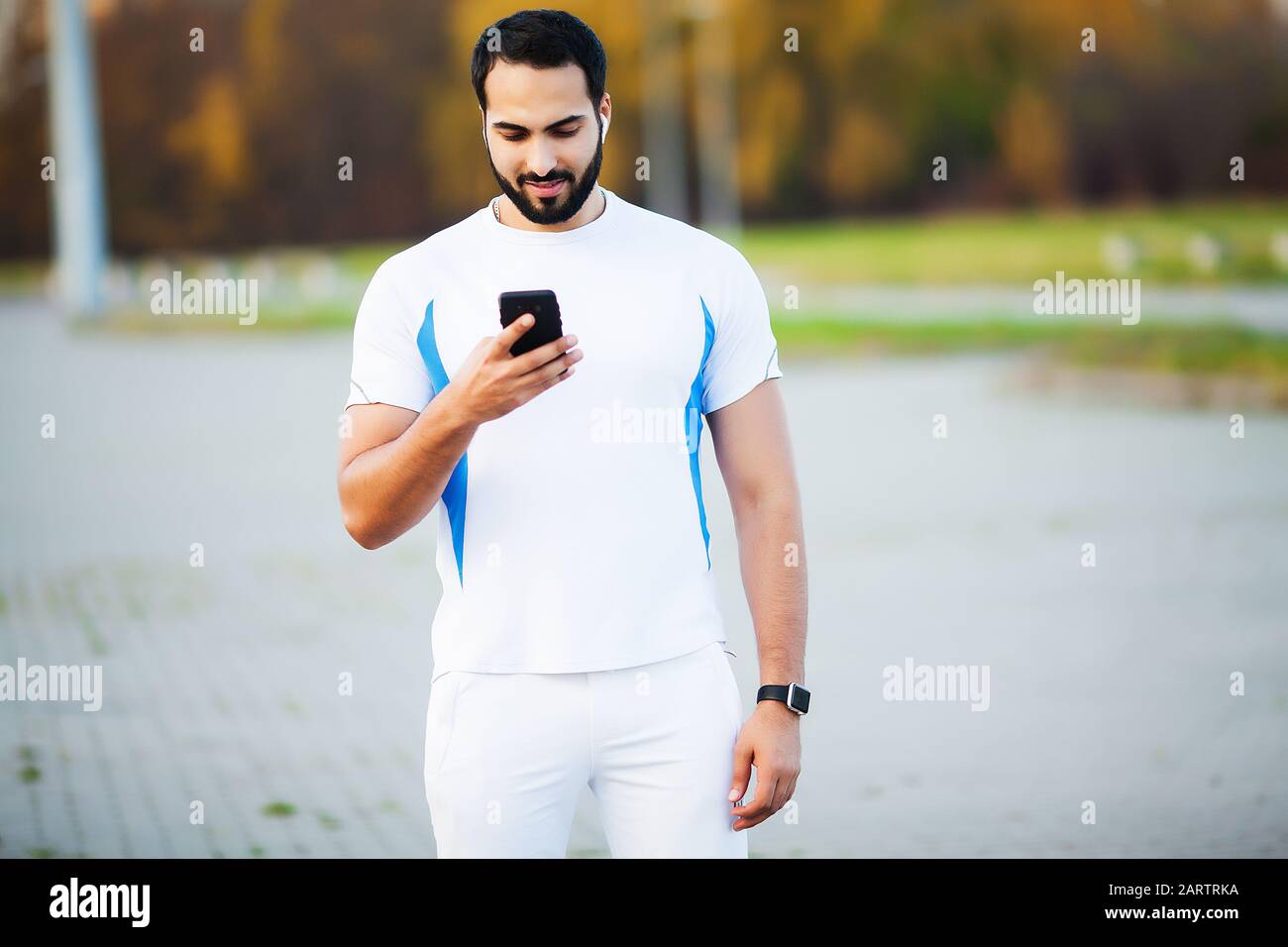 Fit muscular man running outside. Fitness and sport concept Stock Photo ...