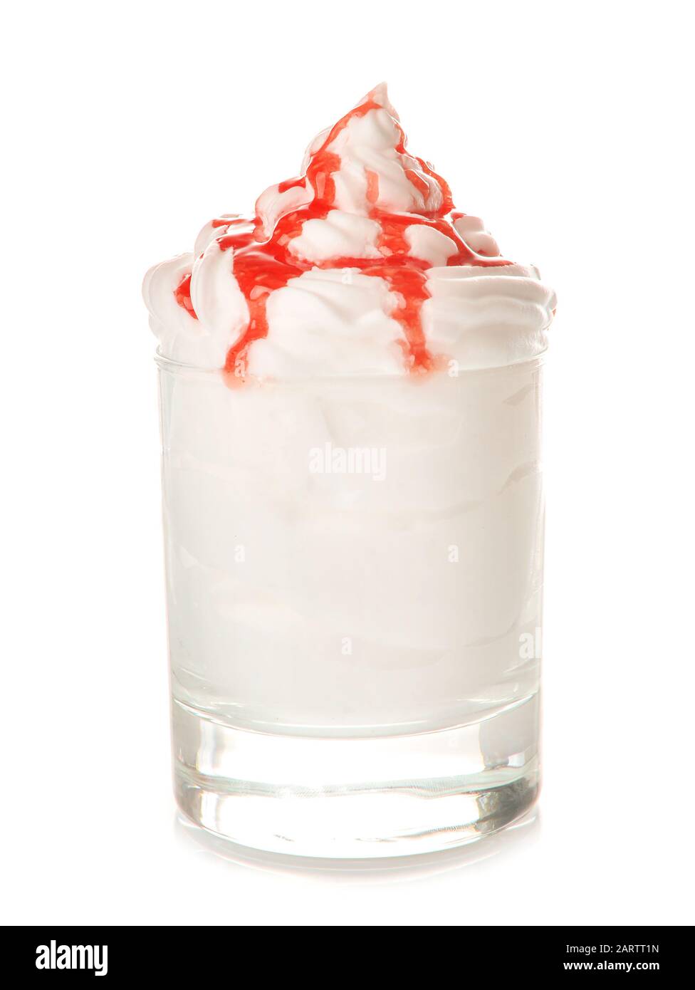 Whipped cream with syrup in glass on white background Stock Photo - Alamy