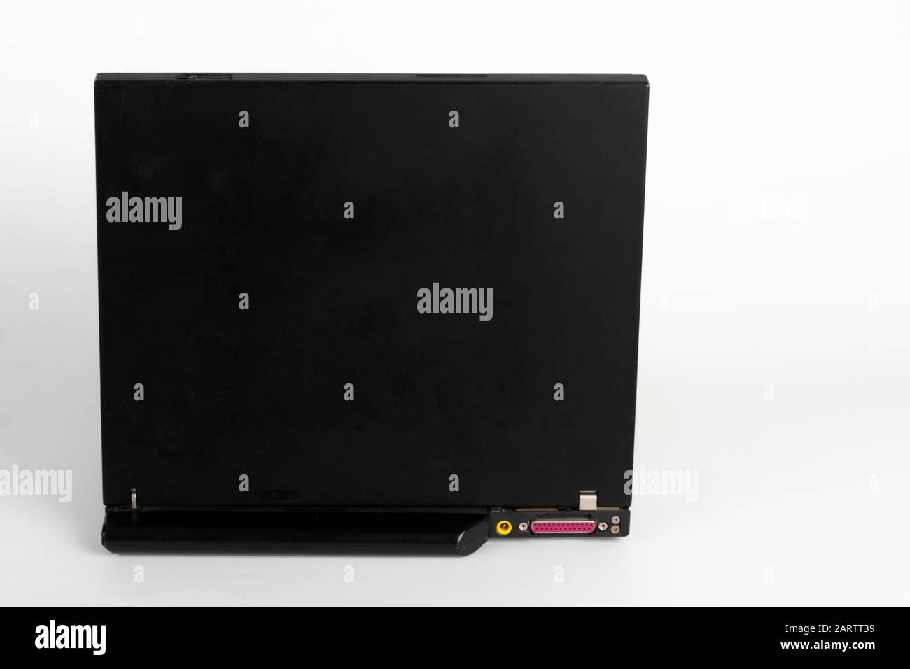 Old laptop on white background, which was produced in 2003, diagonal ...