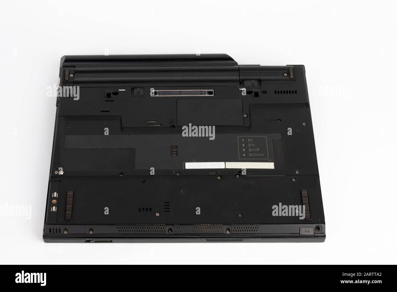 View of the underside of the laptop on white background, notebook was ...