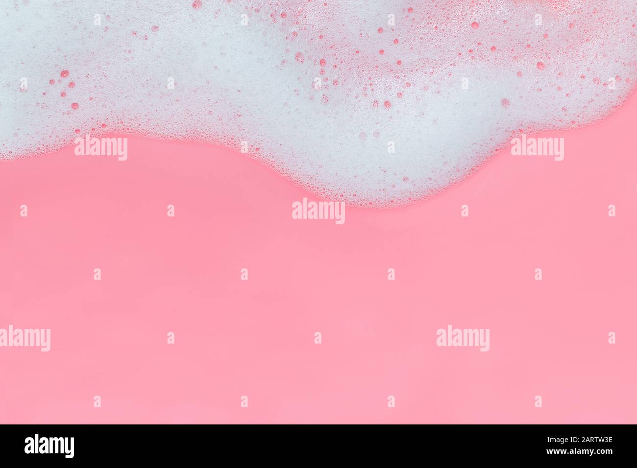Pink foam bubbles on pink background Stock Photo - Alamy