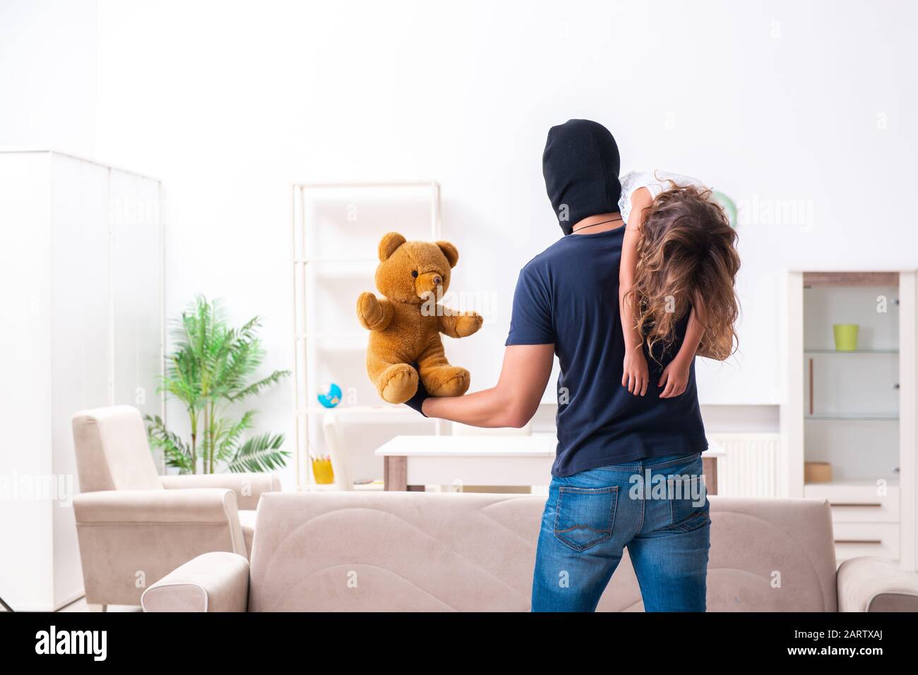 Child stealing toy hi-res stock photography and images - Alamy