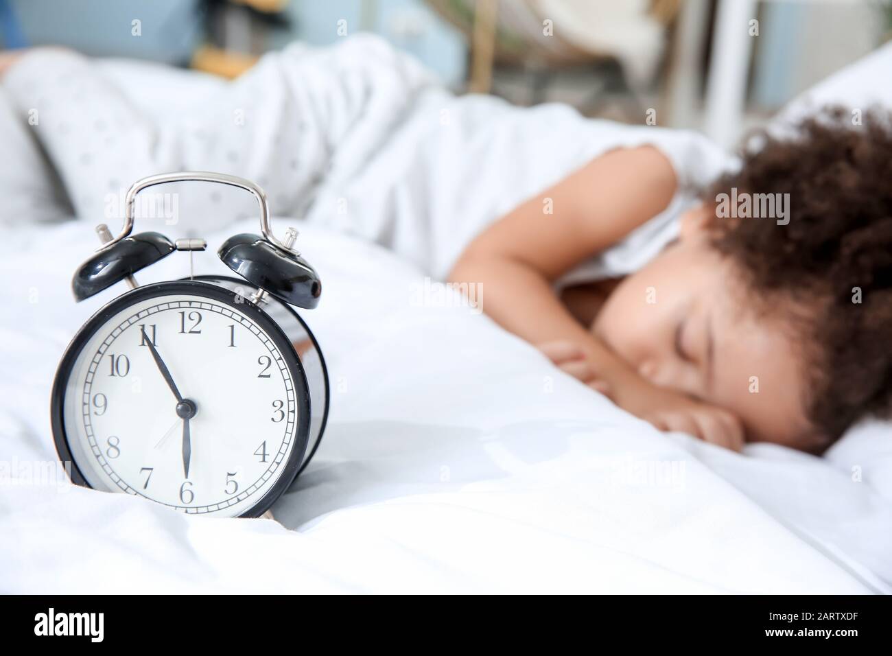 African child alarm clock hi-res stock photography and images - Alamy