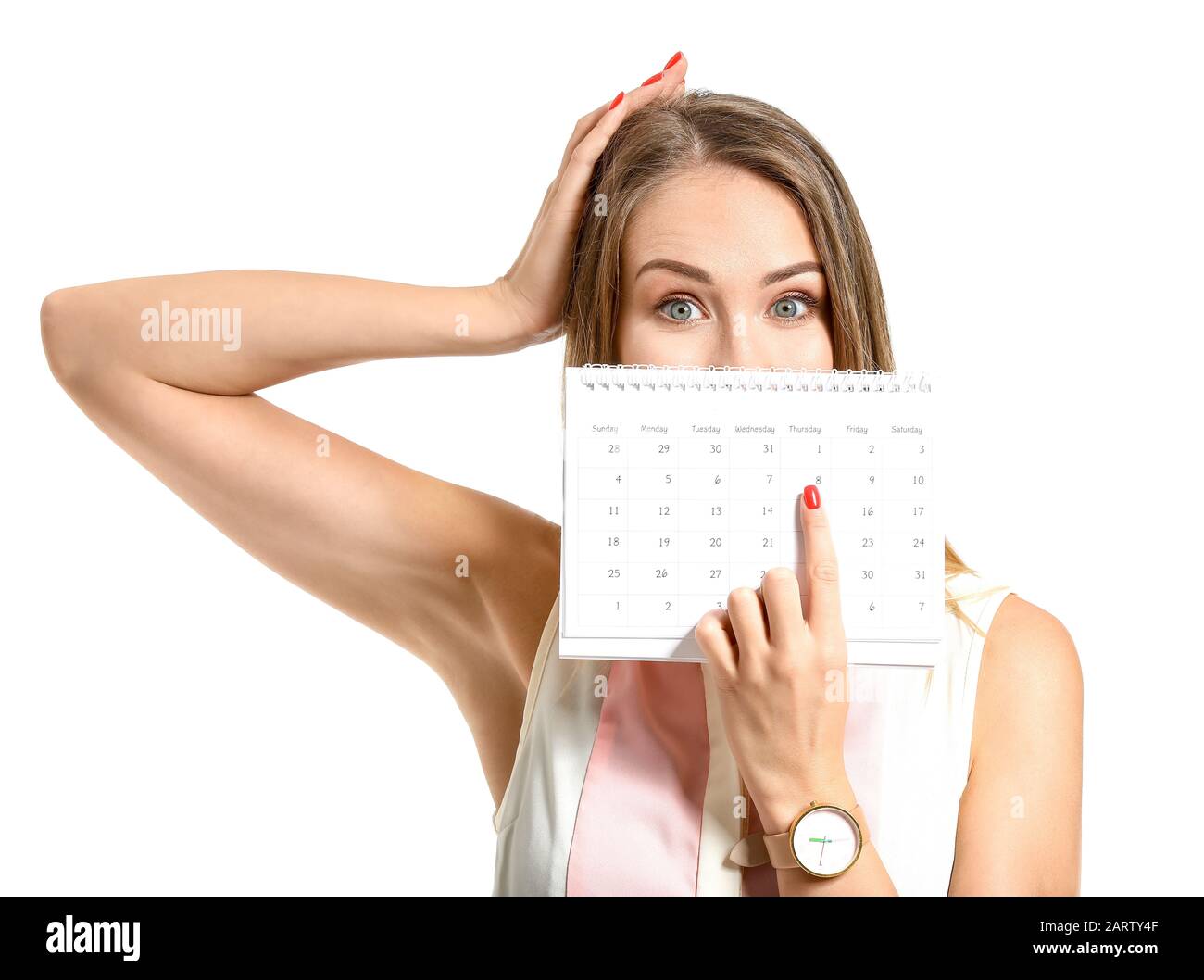 Beautiful young woman with calendar on white background. International ...