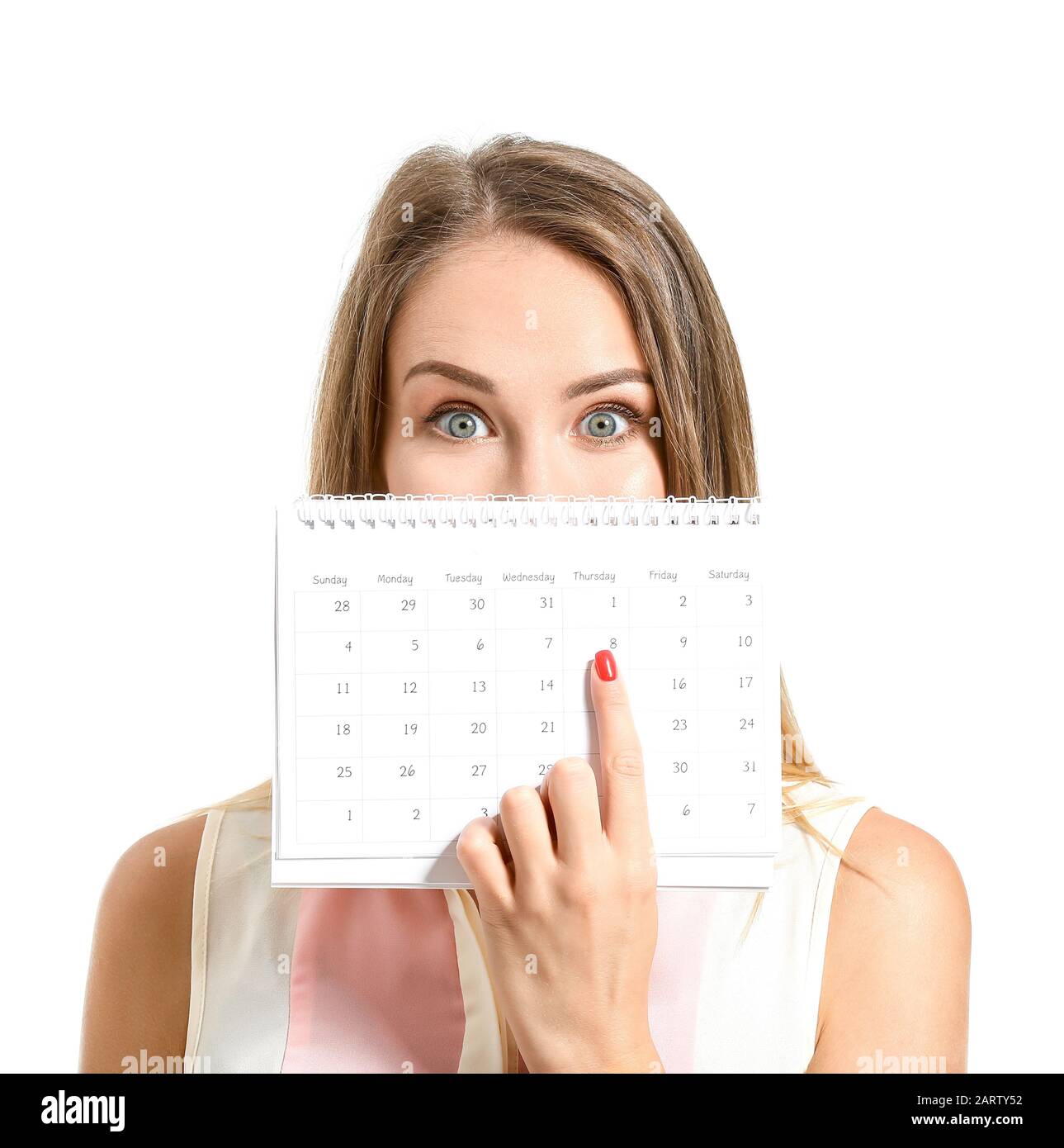 Beautiful young woman with calendar on white background. International ...