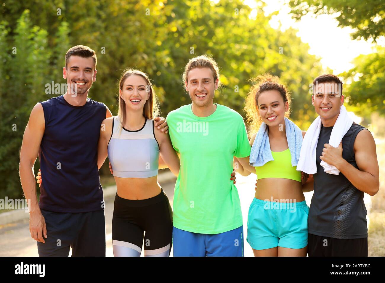 Group of sporty young people outdoors Stock Photo - Alamy
