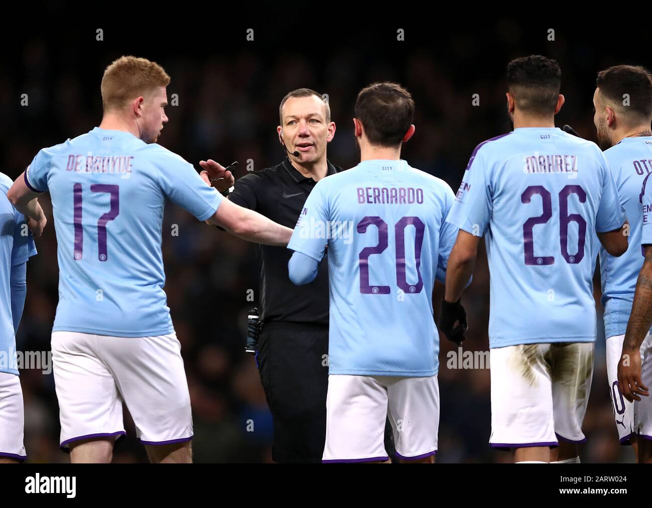 Referee soccer players during match hi-res stock photography and images ...