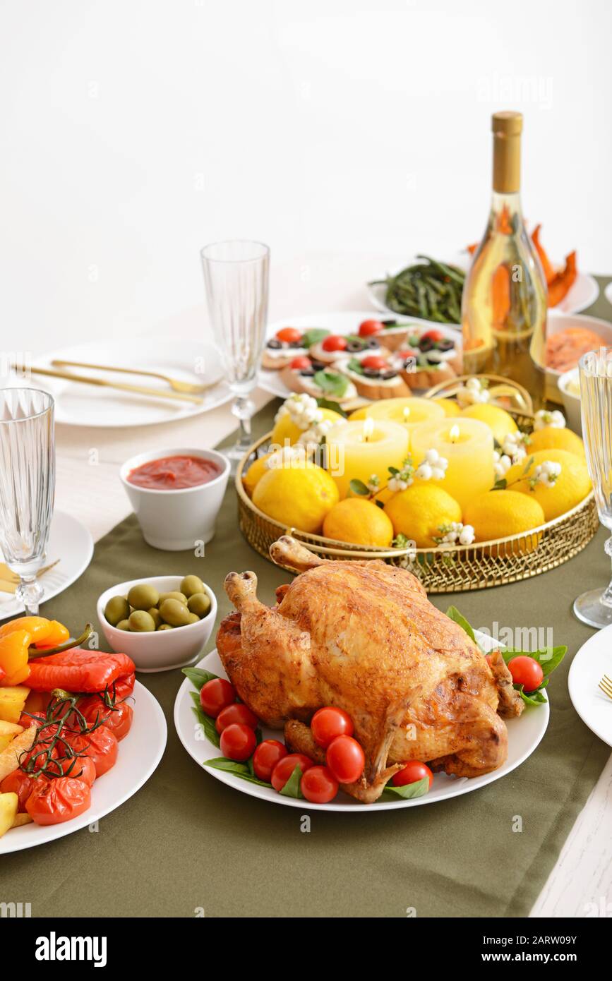 Many dishes served on table for big family dinner Stock Photo - Alamy