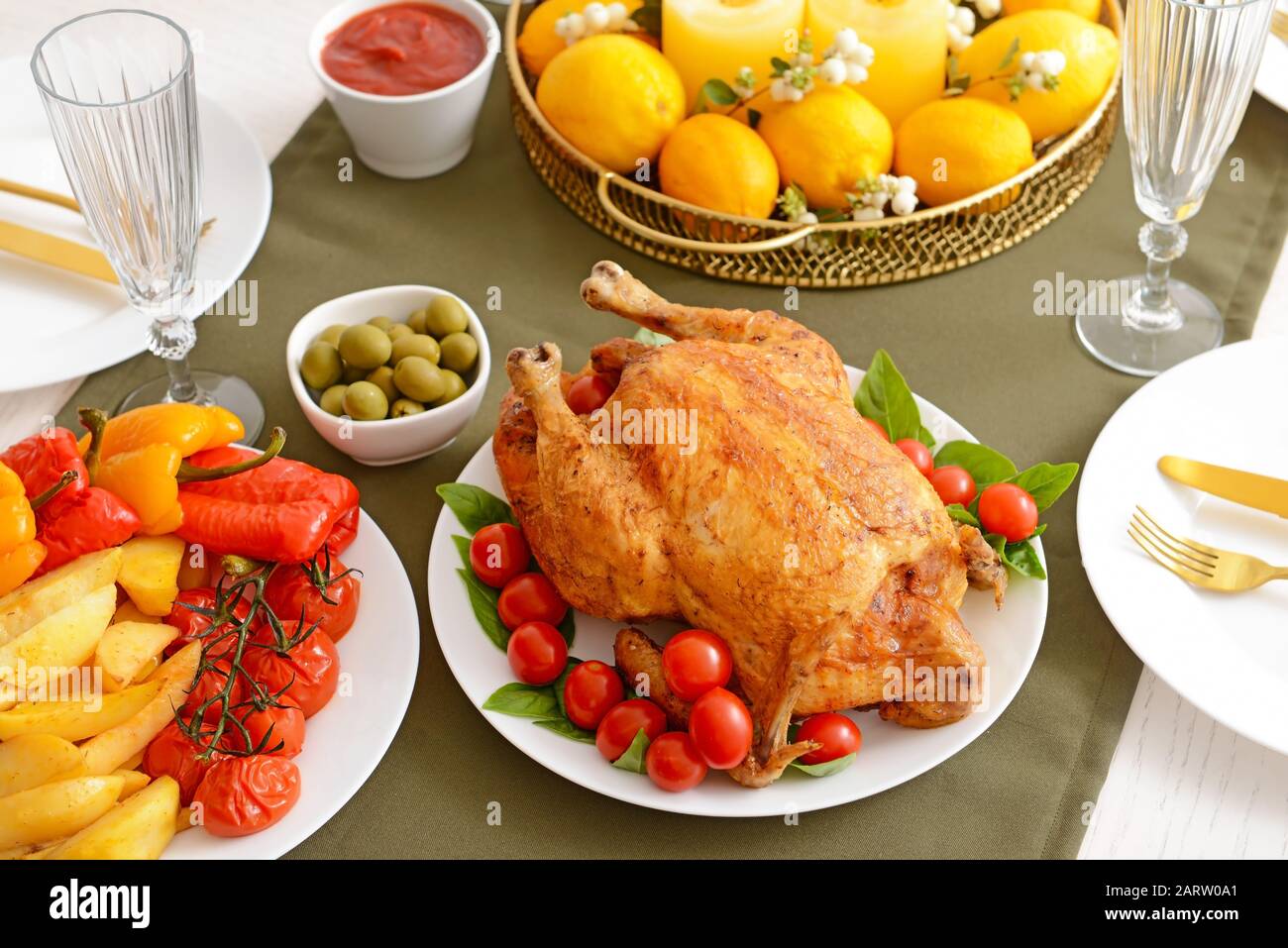 Many dishes served on table for big family dinner Stock Photo - Alamy