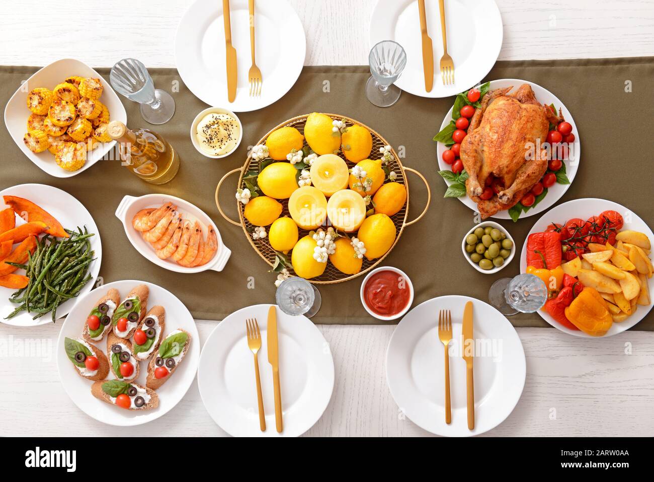 Table set for big family dinner, top view Stock Photo - Alamy