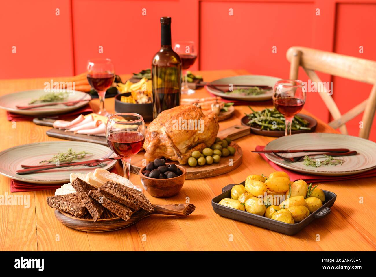 Table set for big family dinner Stock Photo - Alamy