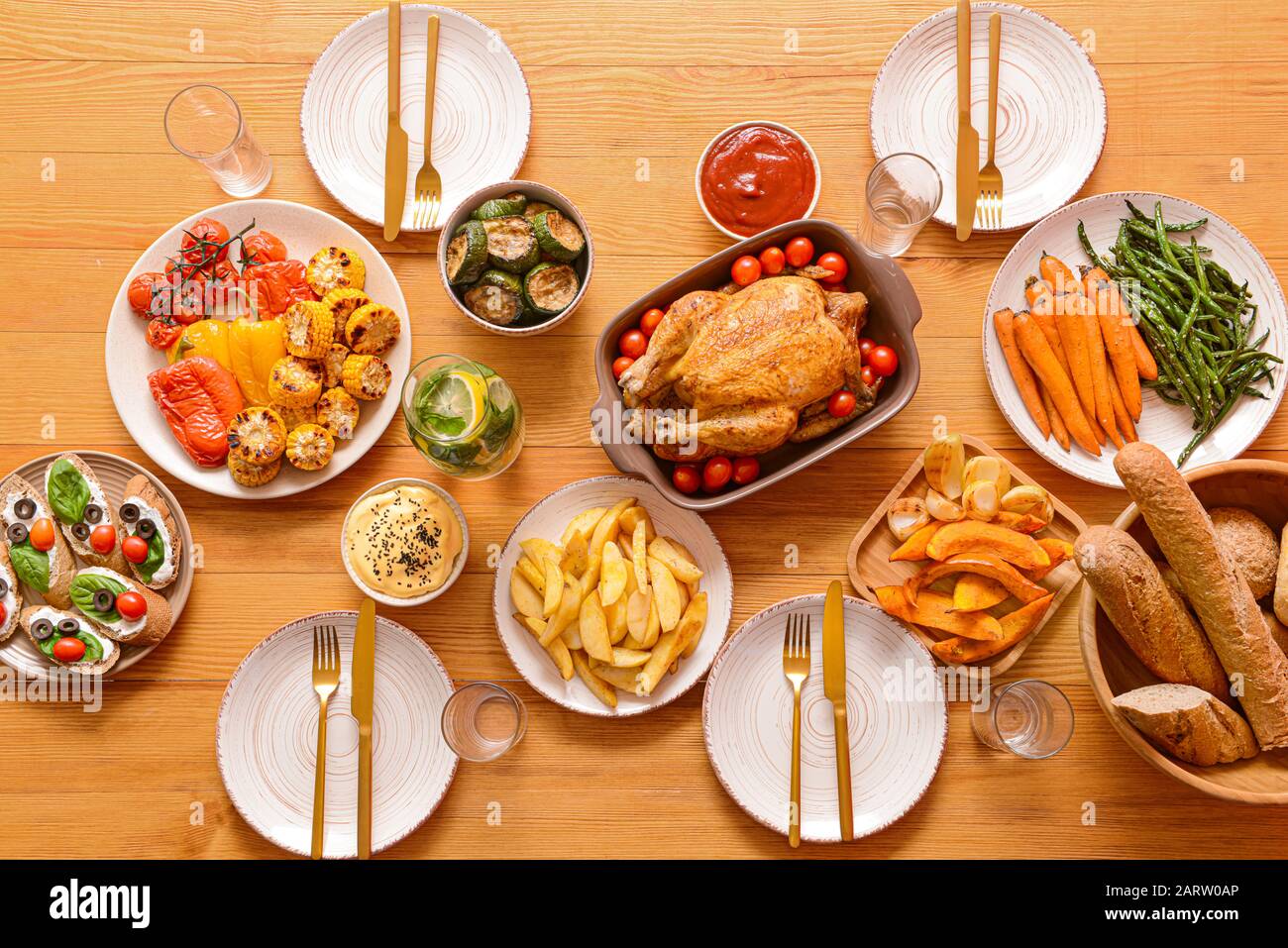 Table set for big family dinner, top view Stock Photo - Alamy