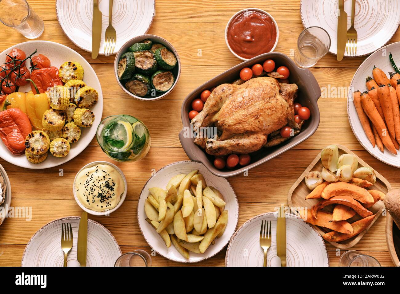 Table set for big family dinner, top view Stock Photo - Alamy