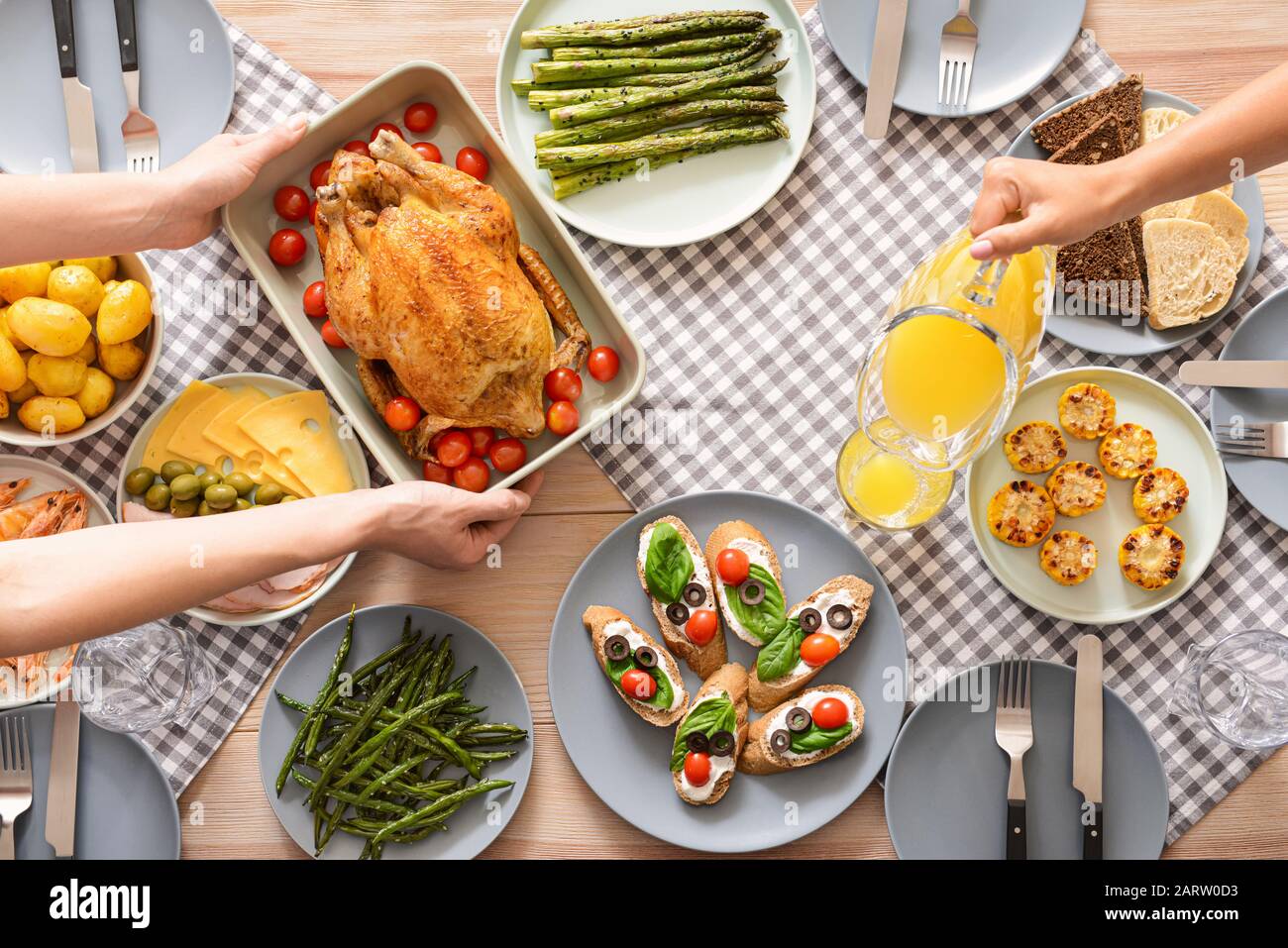 Friends having dinner at table, top view Stock Photo - Alamy
