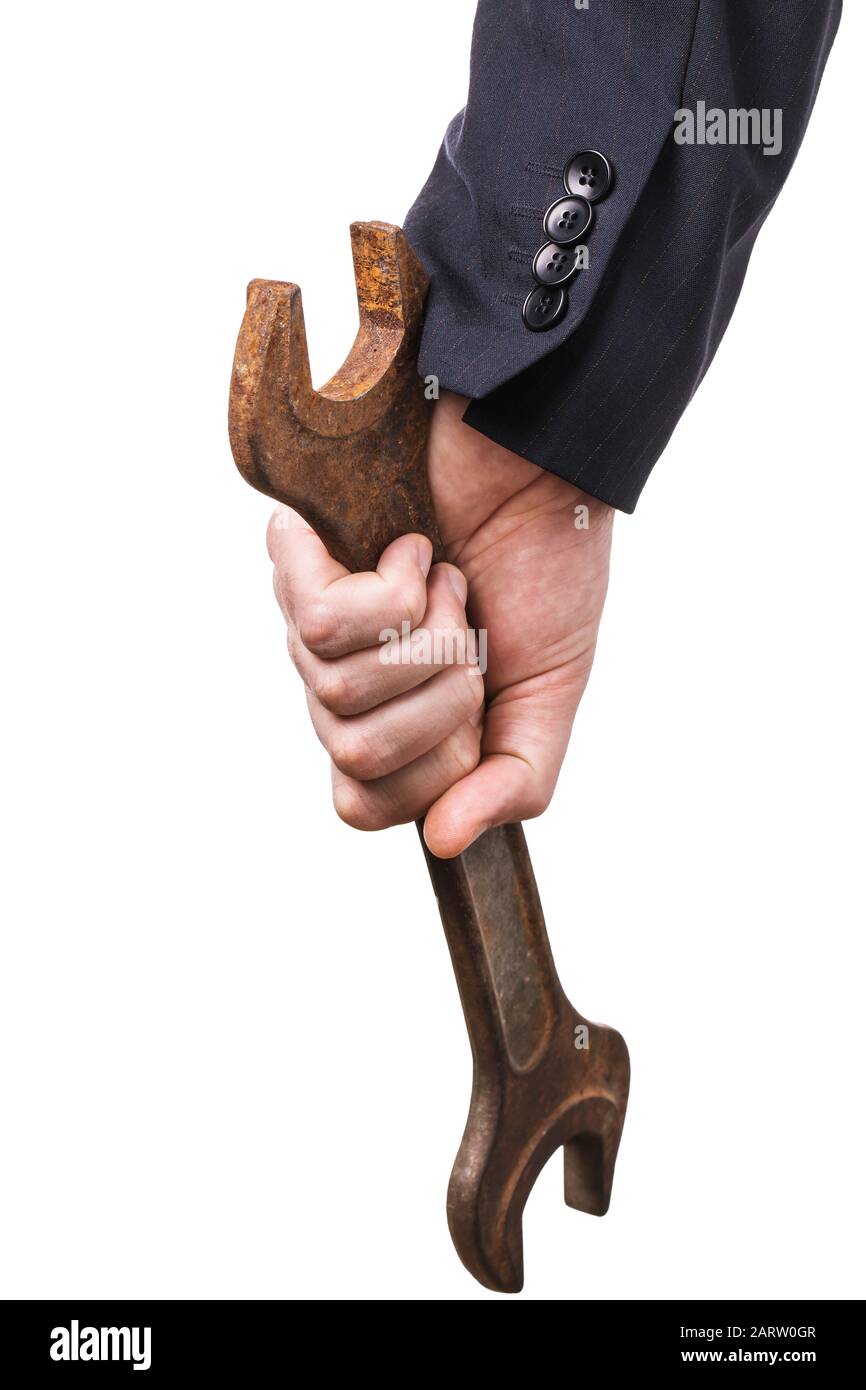 Rusty wrench in hand isolated on a white background. Concept on the ...