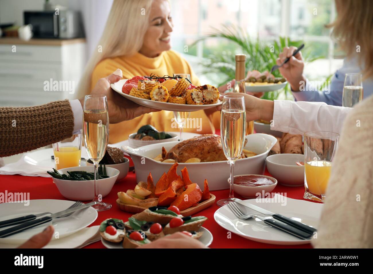 Big family having dinner at home Stock Photo - Alamy