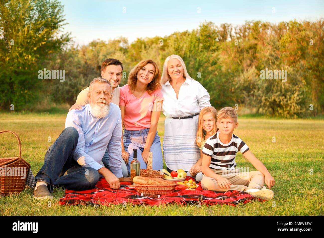 Big family having picnic outdoors hi-res stock photography and images ...