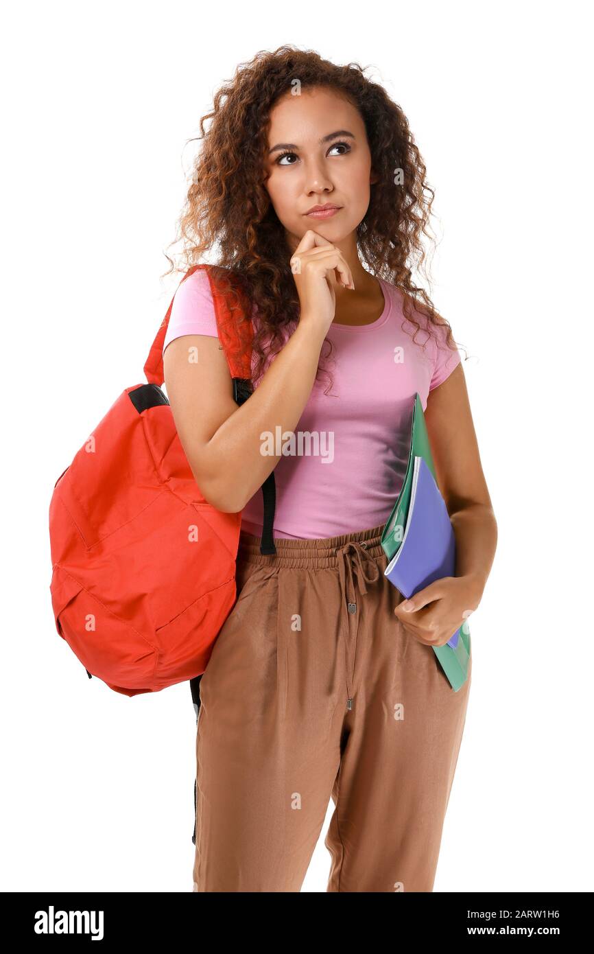 Portrait of thoughtful African-American student on white background ...