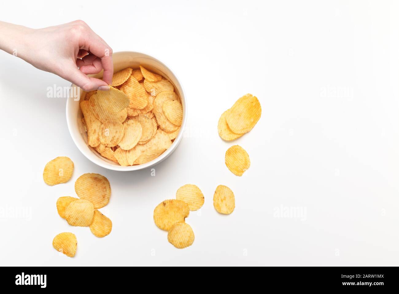 Hand and chips hi-res stock photography and images - Alamy