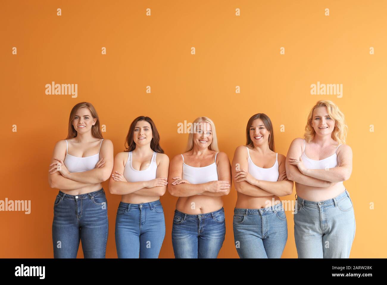 Group of body positive women on color background Stock Photo - Alamy