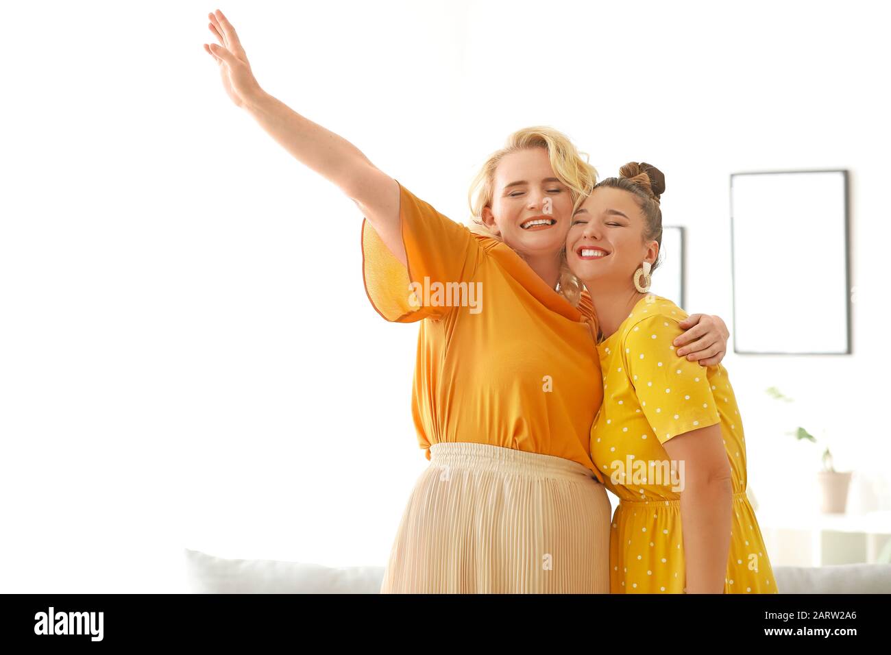 Happy body positive women at home Stock Photo - Alamy