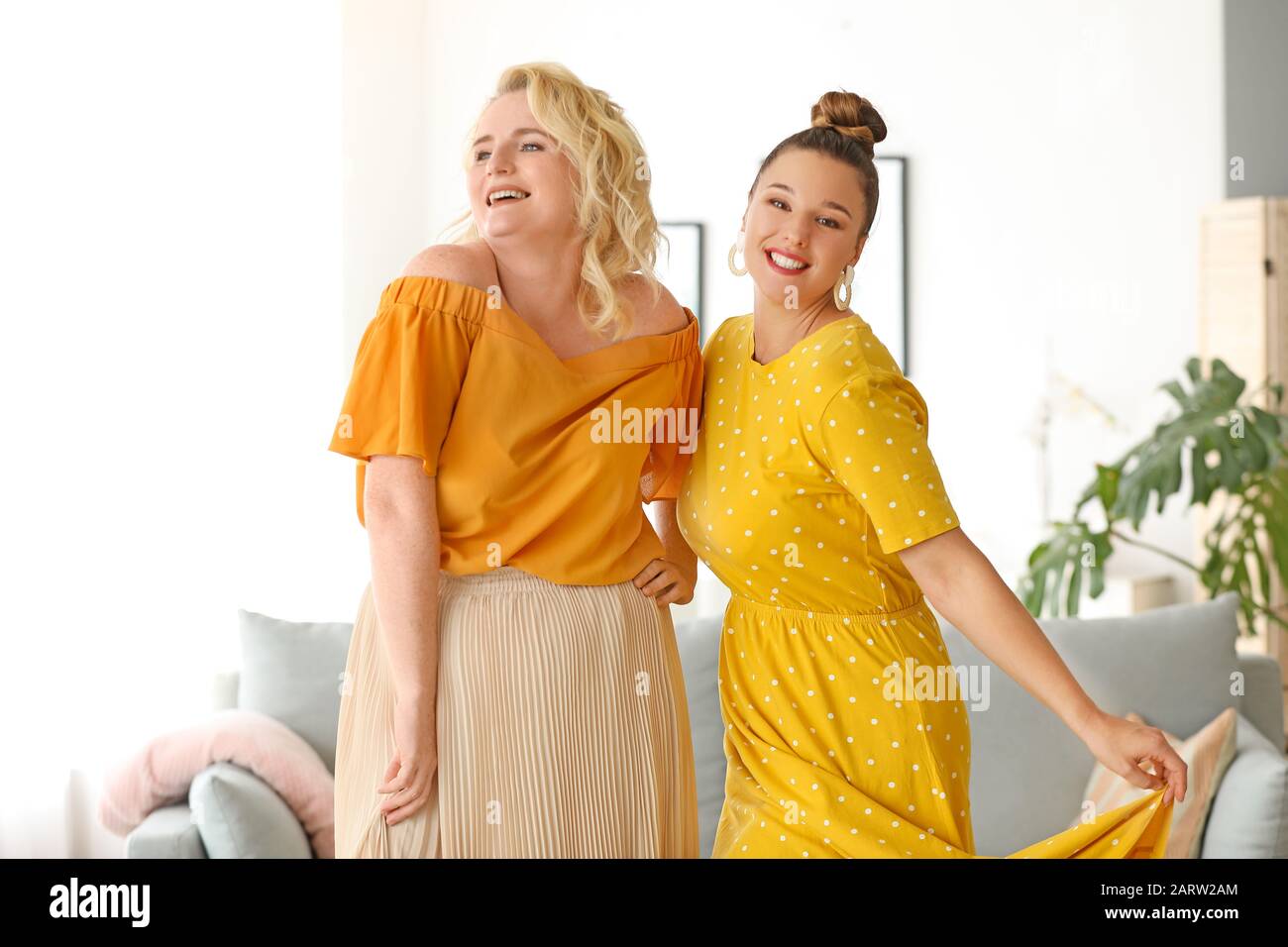 Happy body positive women at home Stock Photo - Alamy