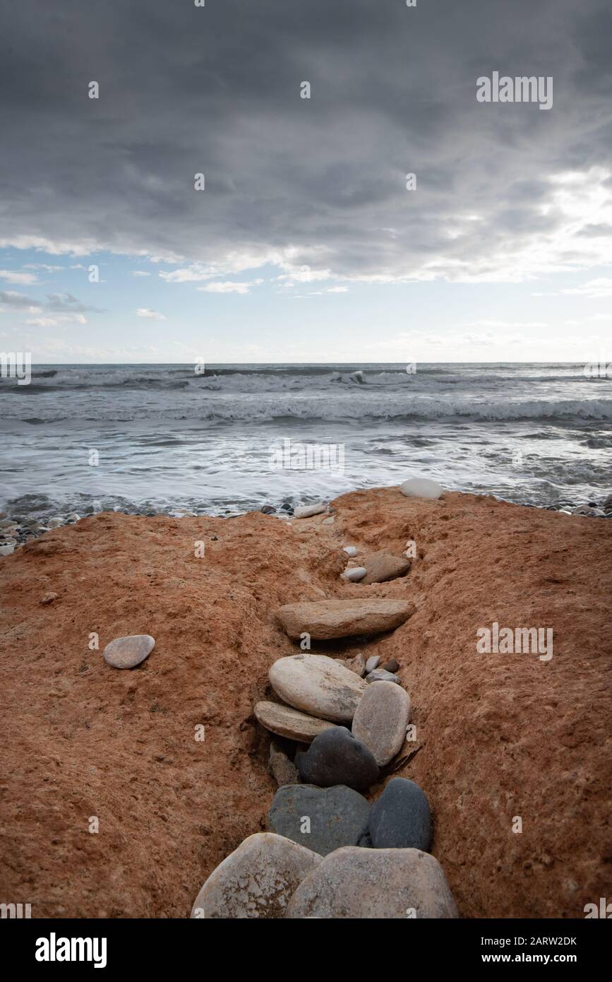 Row of pebbles hi-res stock photography and images - Alamy