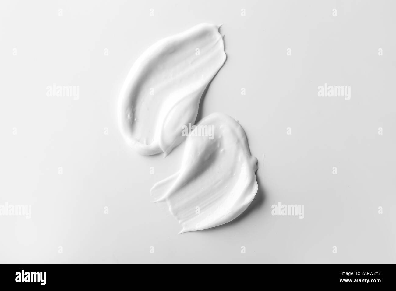 Natural cream on white background Stock Photo - Alamy