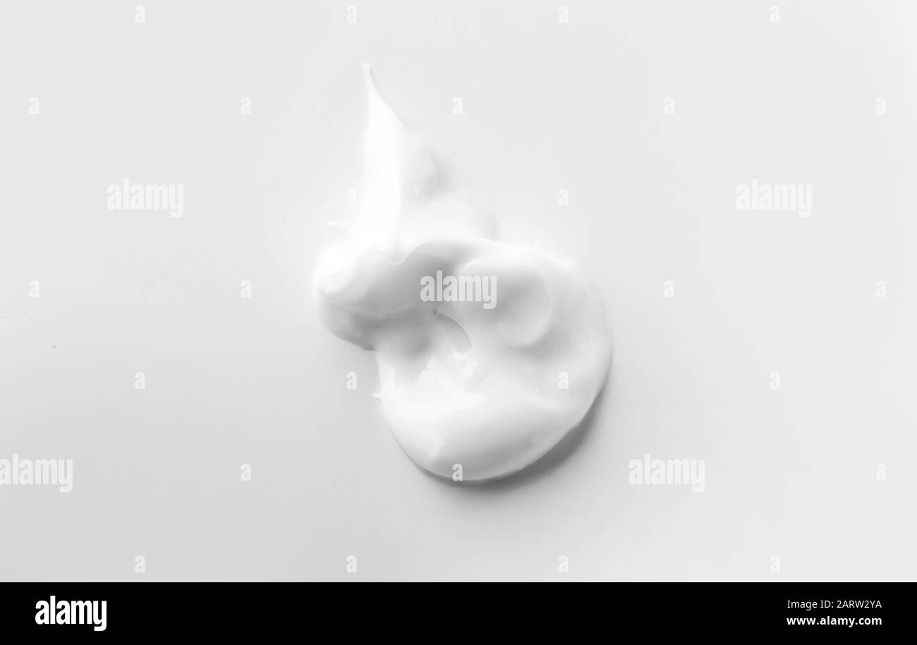 Natural cream on white background Stock Photo - Alamy
