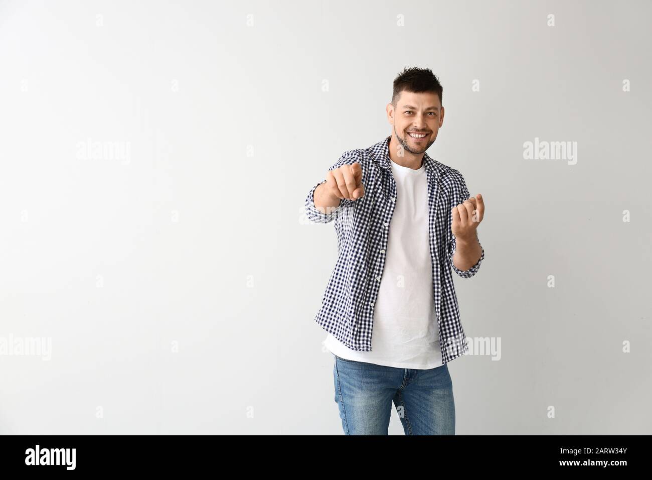 Man pointing hand inviting hi-res stock photography and images - Alamy