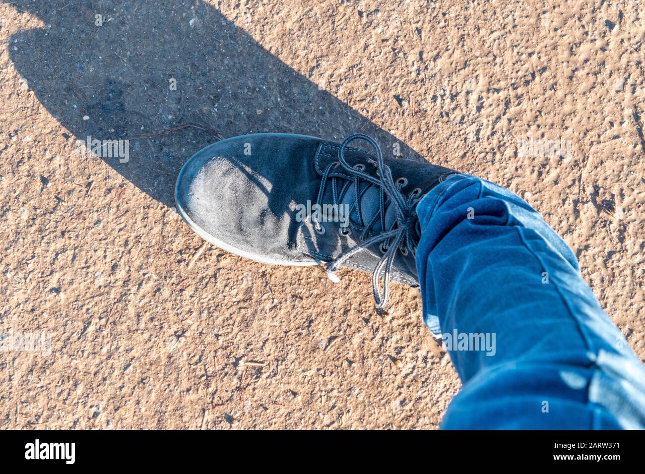 bucketful of dust on a child's foot Stock Photo - Alamy