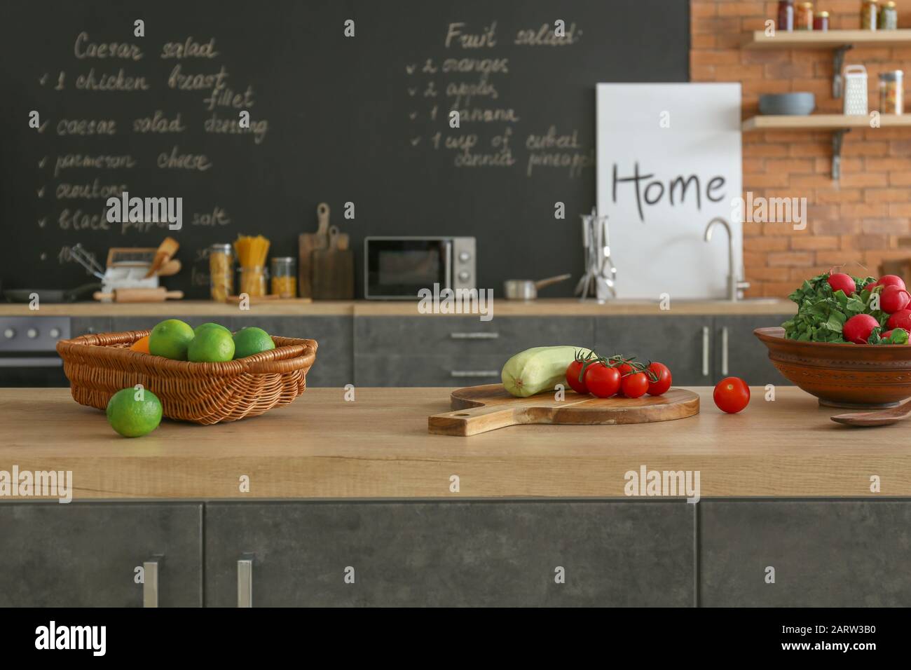 Products on table in modern kitchen Stock Photo - Alamy
