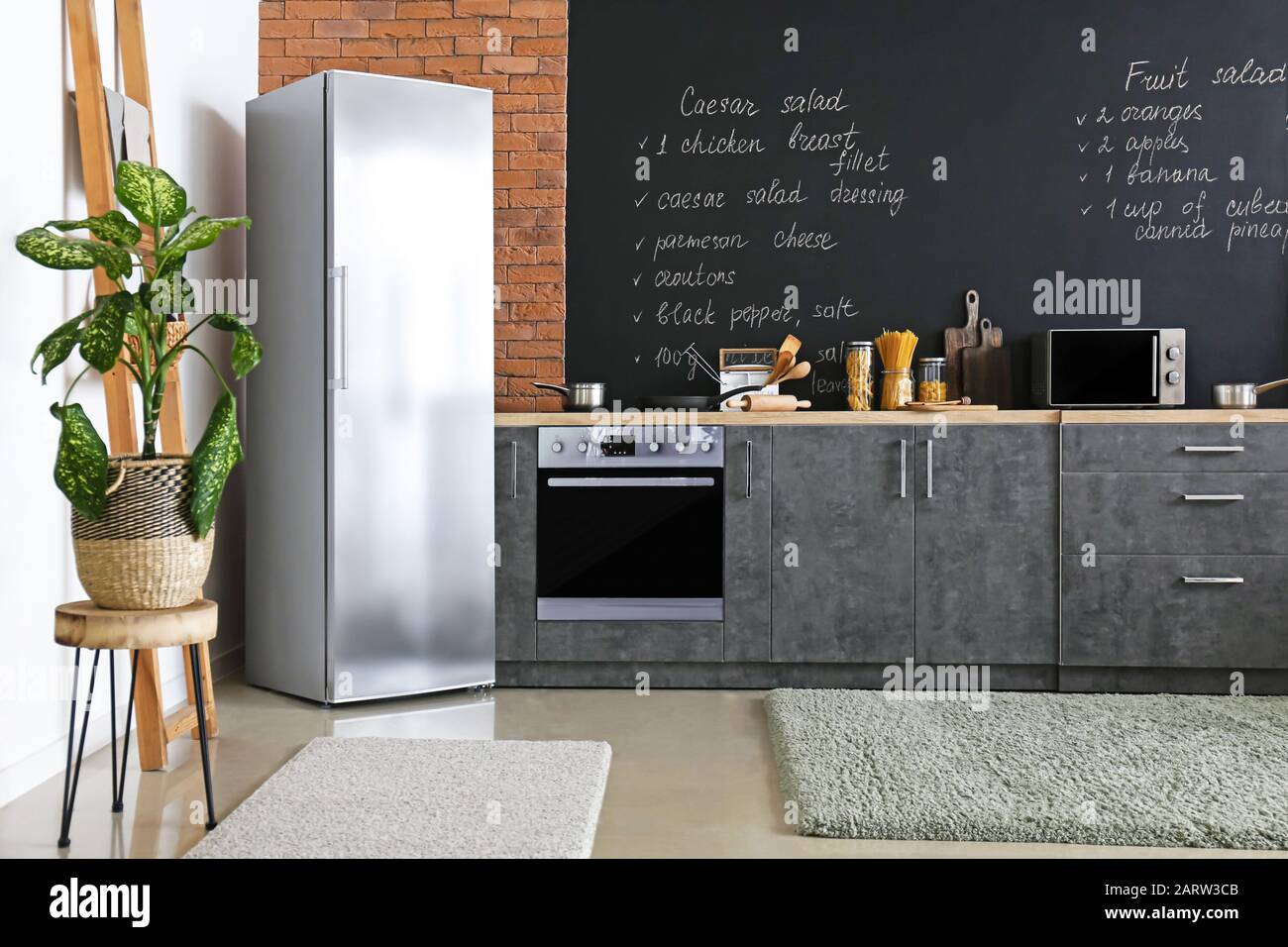 Interior of modern comfortable kitchen Stock Photo - Alamy