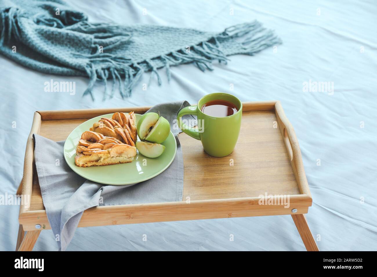 Table with tasty breakfast on bed Stock Photo - Alamy