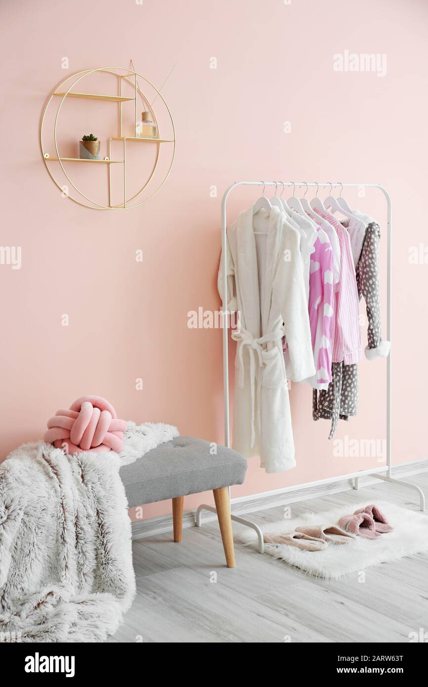 Interior of hall with clothes rack Stock Photo - Alamy