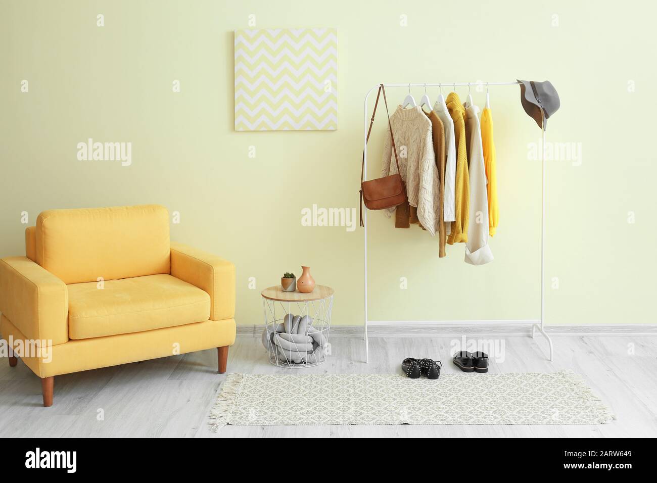 Interior of hall with clothes rack Stock Photo - Alamy
