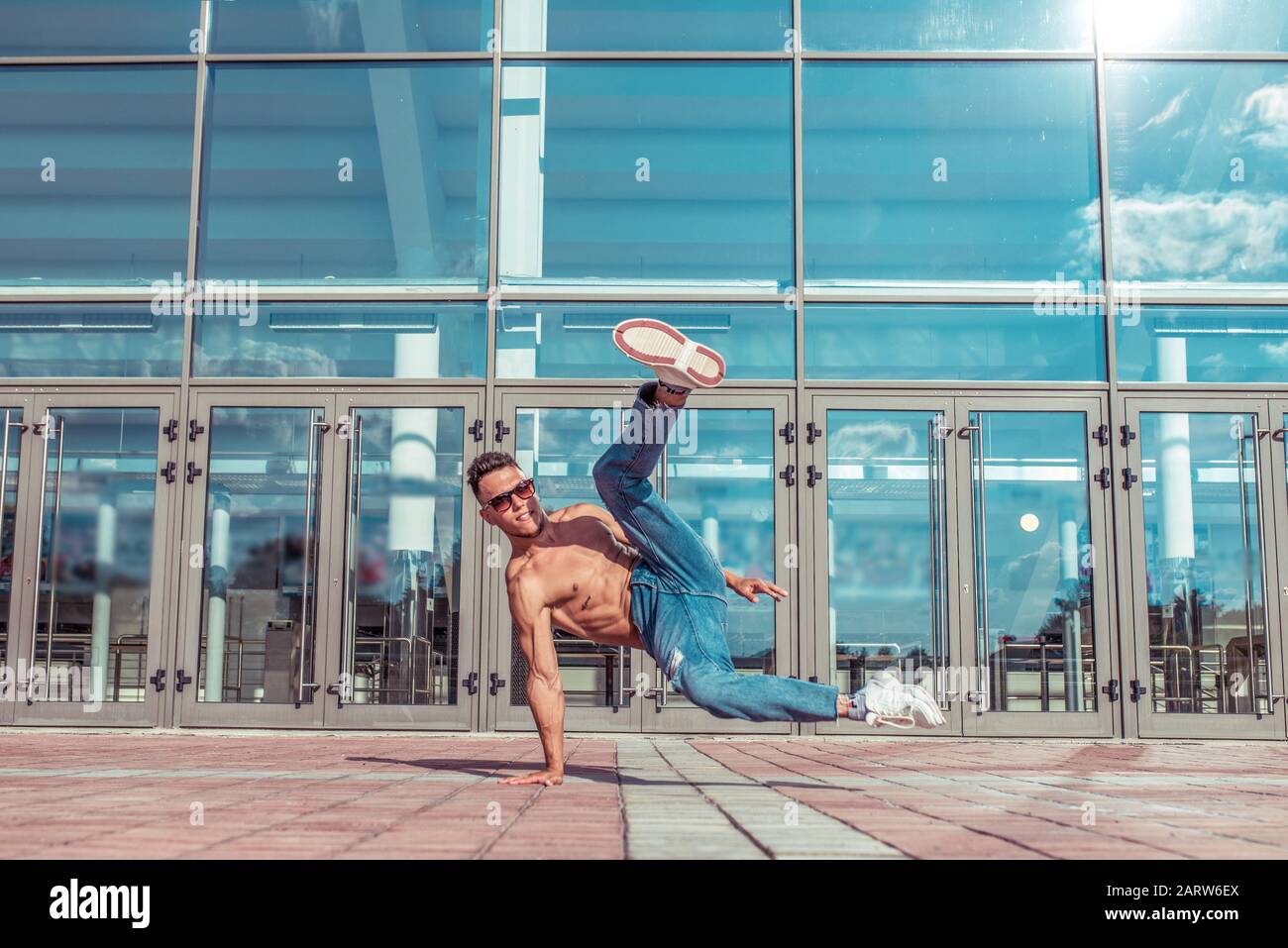 Male break-dancer, muscular torso, dancer, young guy, summer city ...