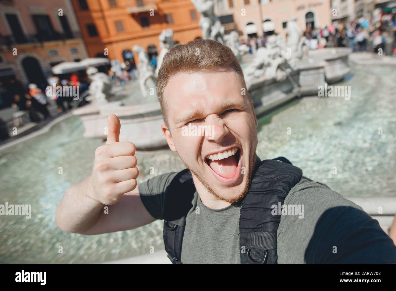 Happy man tourist taking selfie photo on background fountain Four ...